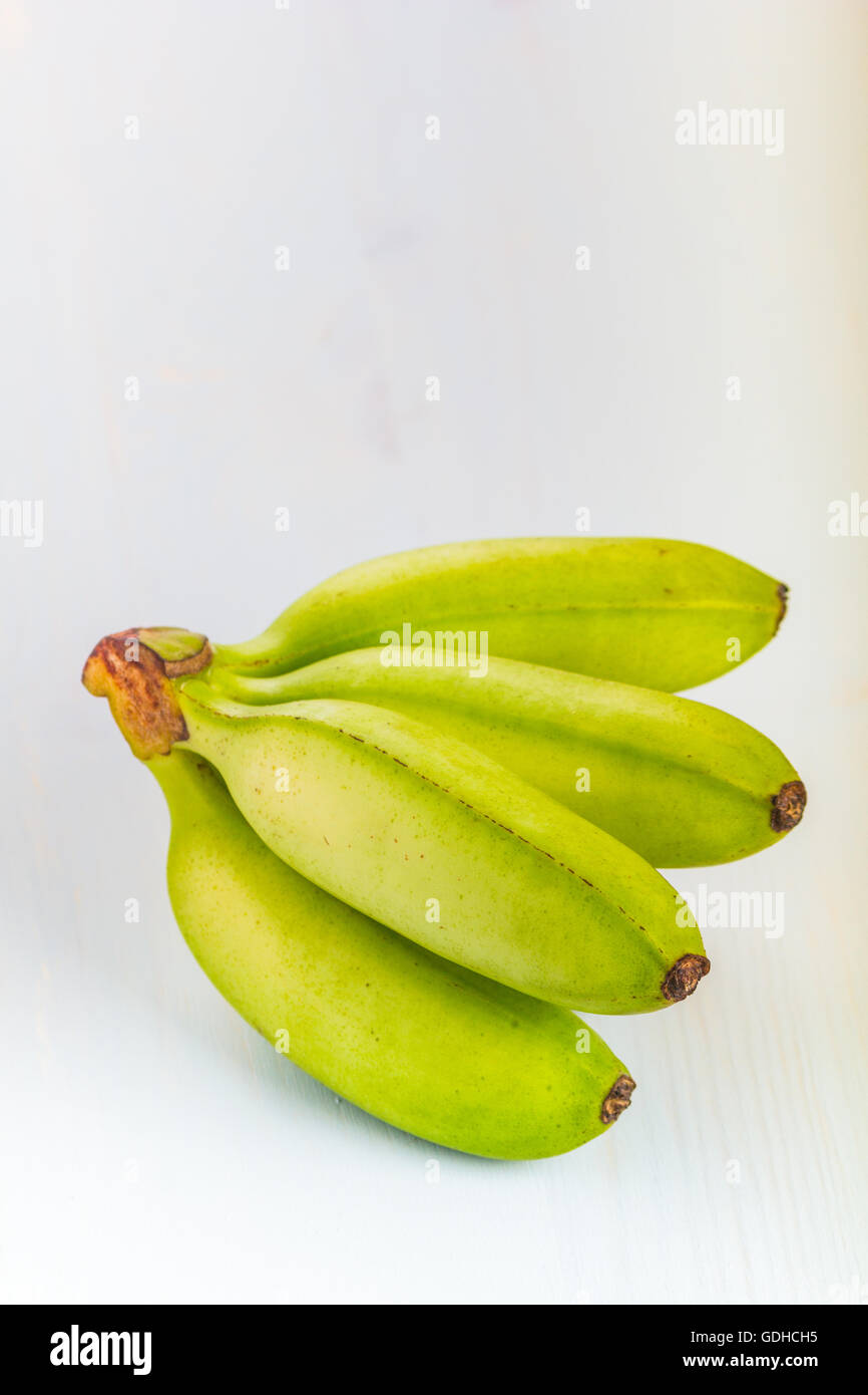 Bananas on timber board hi-res stock photography and images - Alamy