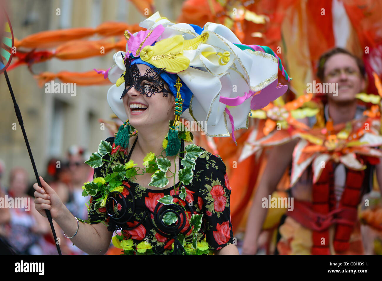Dancer in costume at Bath Carnival. Bath Carnival procession, bringing ...