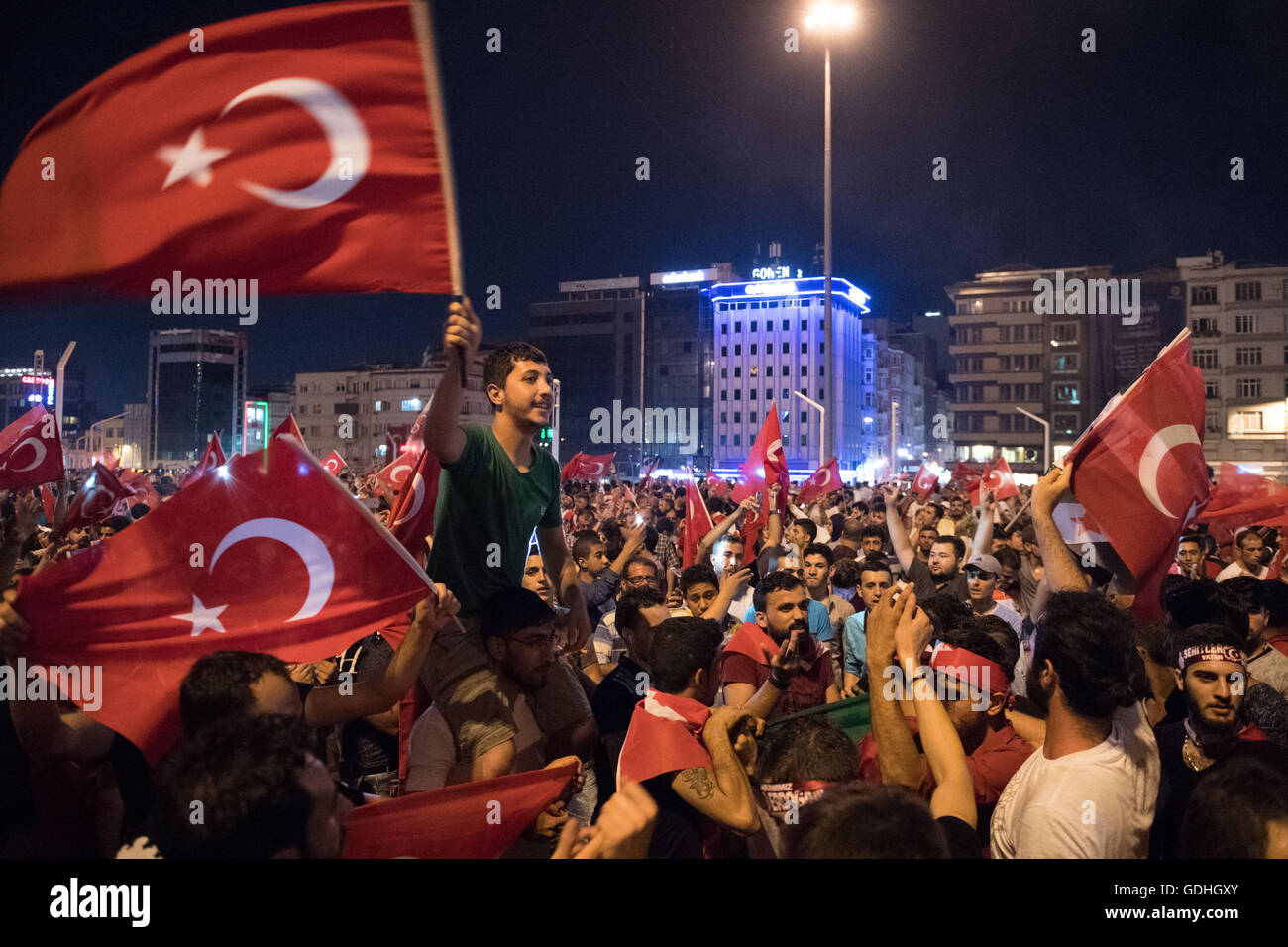 Istanbul, Turkey. 16th July, 2016. People shout slogans and hold flags ...