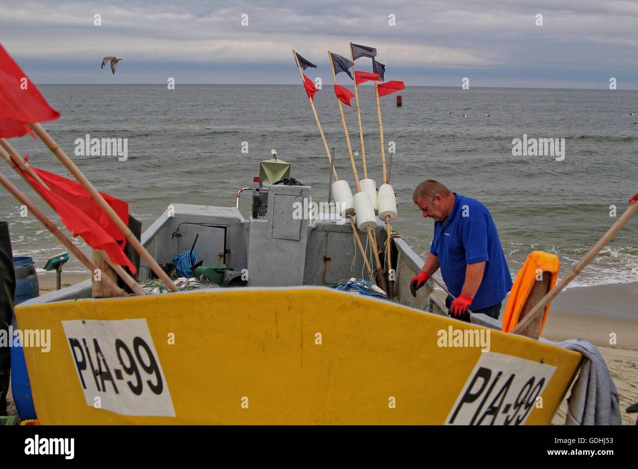 Piaski, Poland 17th, July 2016 Fishermen in Piaski return from the ...