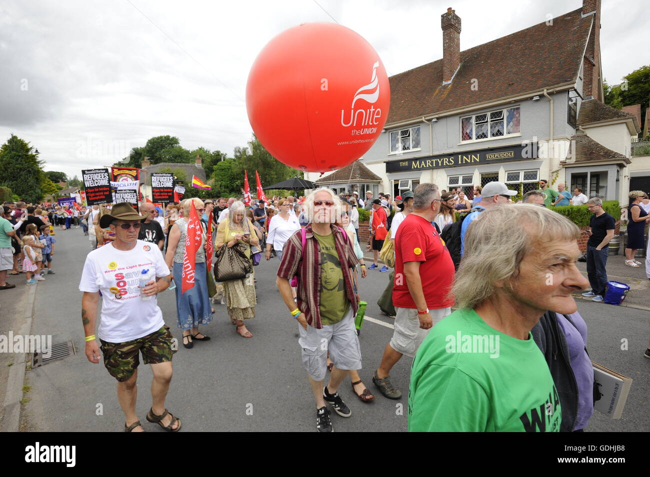 Tolpuddle Martyrs Rally, Dorset, UK. 17th July 2016. The parade passes ...