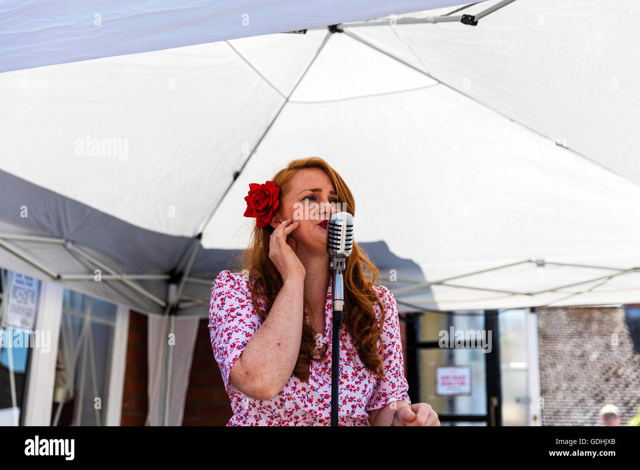 Woman singer singing into microphone 1940's style dress hair Woodhall ...