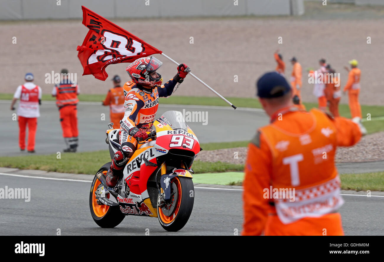 The marshals celebrate the victory of the Spanish MotoGP rider Marc ...