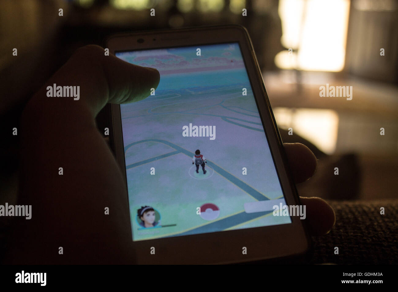 Egypt. 17th July, 2016. An Egyptian man holding his mobile phone and ...