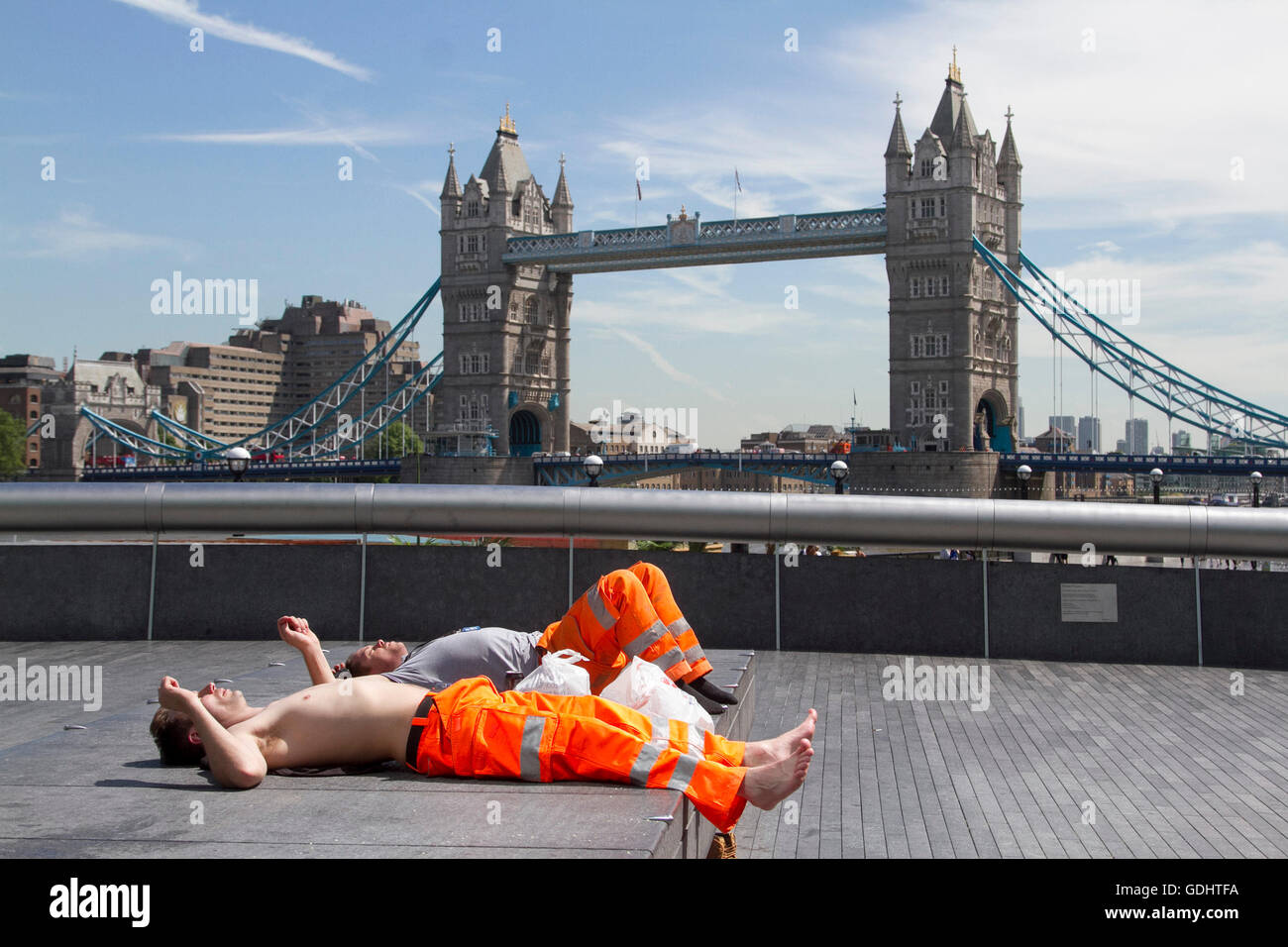 London, 18th July 2016. Workers enjoy the sun on London Riverside on a ...