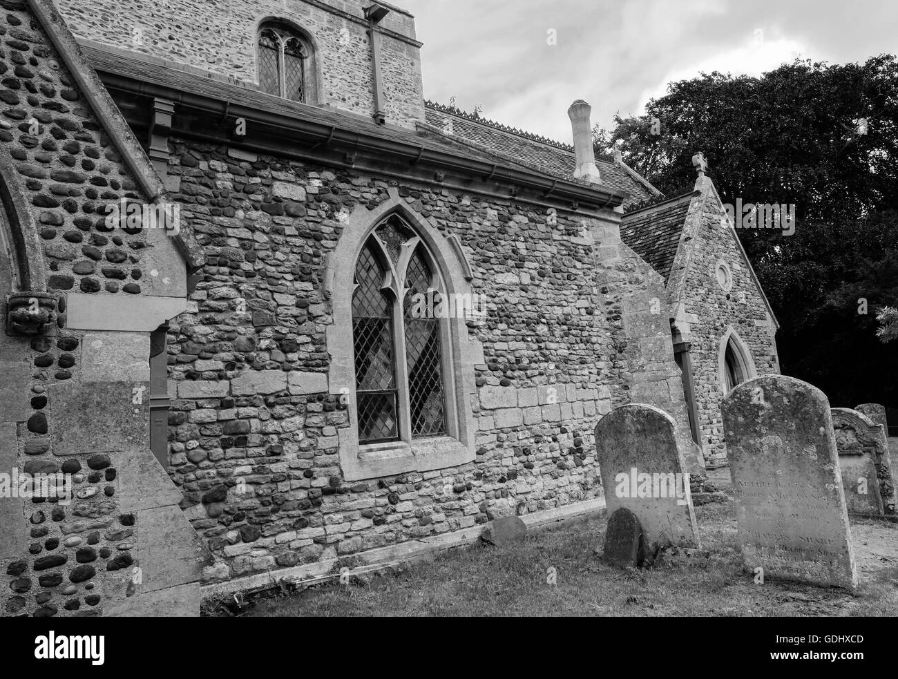 Architectural stonework detail of a medieval church, showing the leaded ...