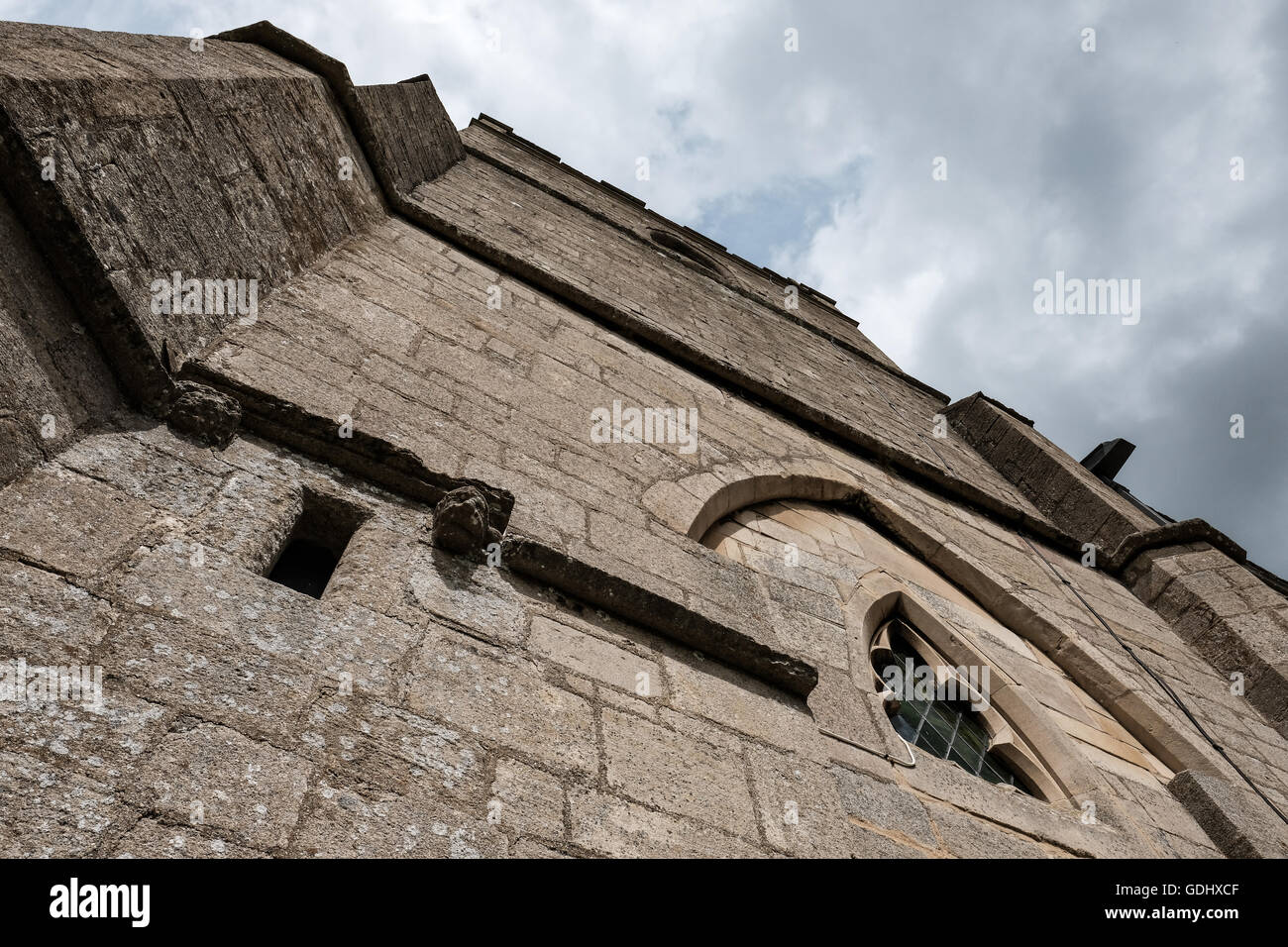Typically designed English church seen with a small cemetery in the ...