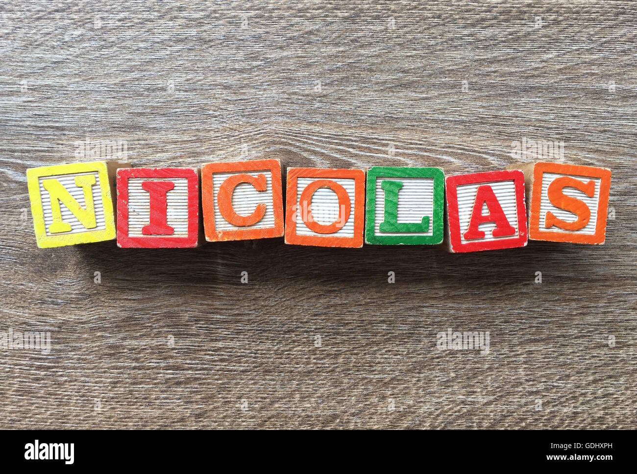 Nicolas name written with wood block letter toys Stock Photo - Alamy