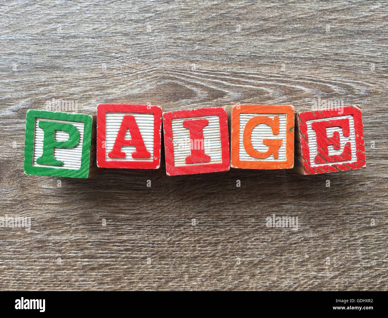 Paige name written with wood block letter toys Stock Photo - Alamy