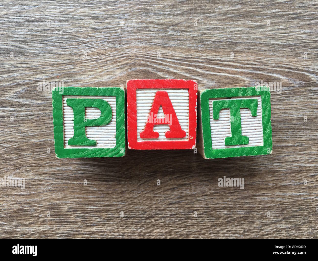 Pat name written with wood block letter toys Stock Photo - Alamy
