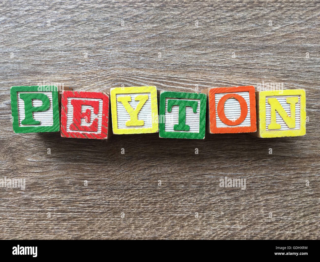 Peyton name written with wood block letter toys Stock Photo - Alamy