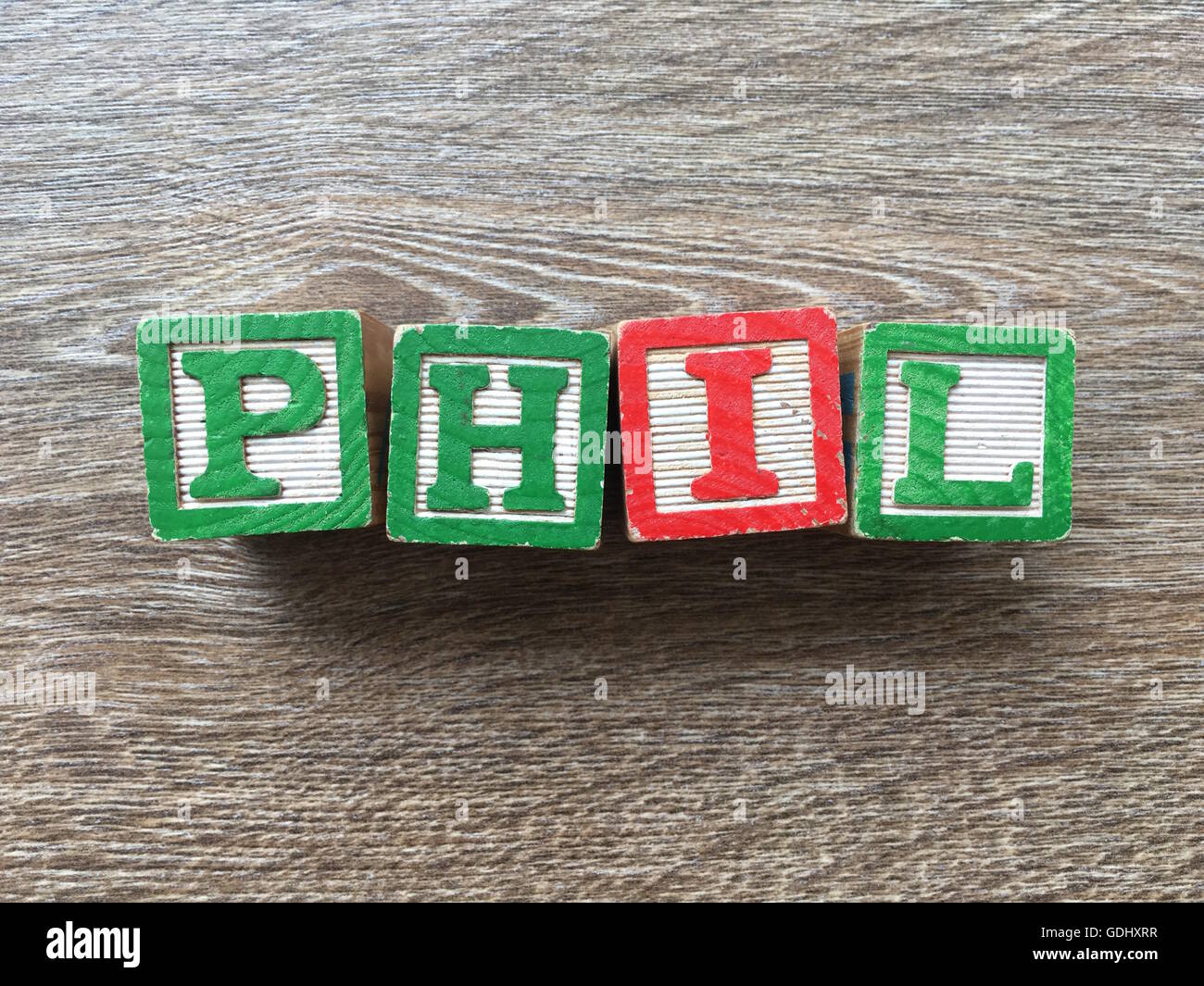 Phil name written with wood block letter toys Stock Photo - Alamy