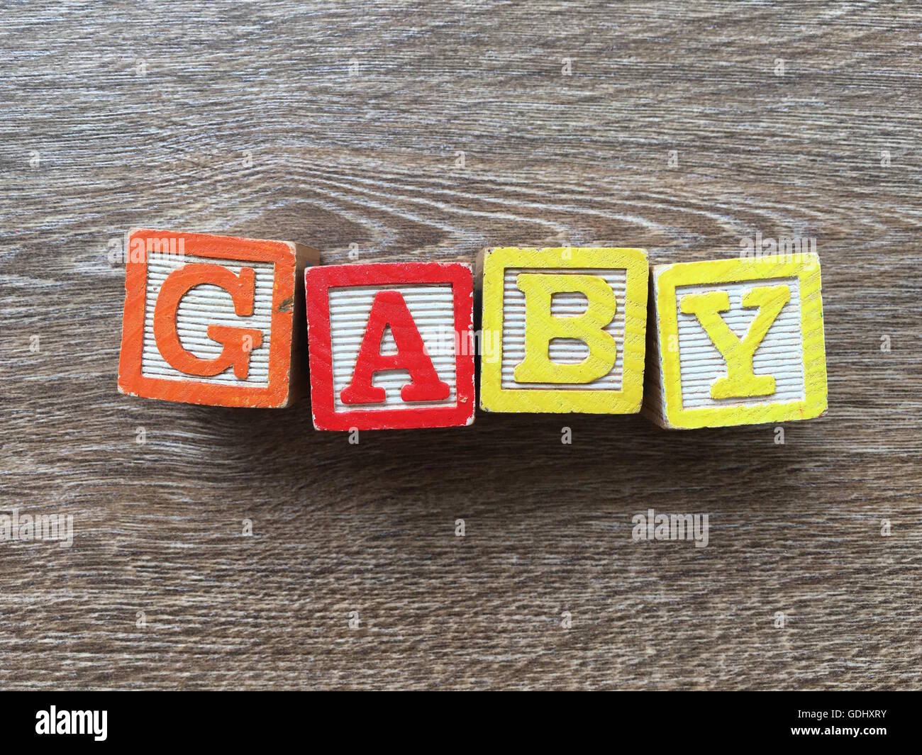 Gaby name written with wood block letter toys Stock Photo - Alamy