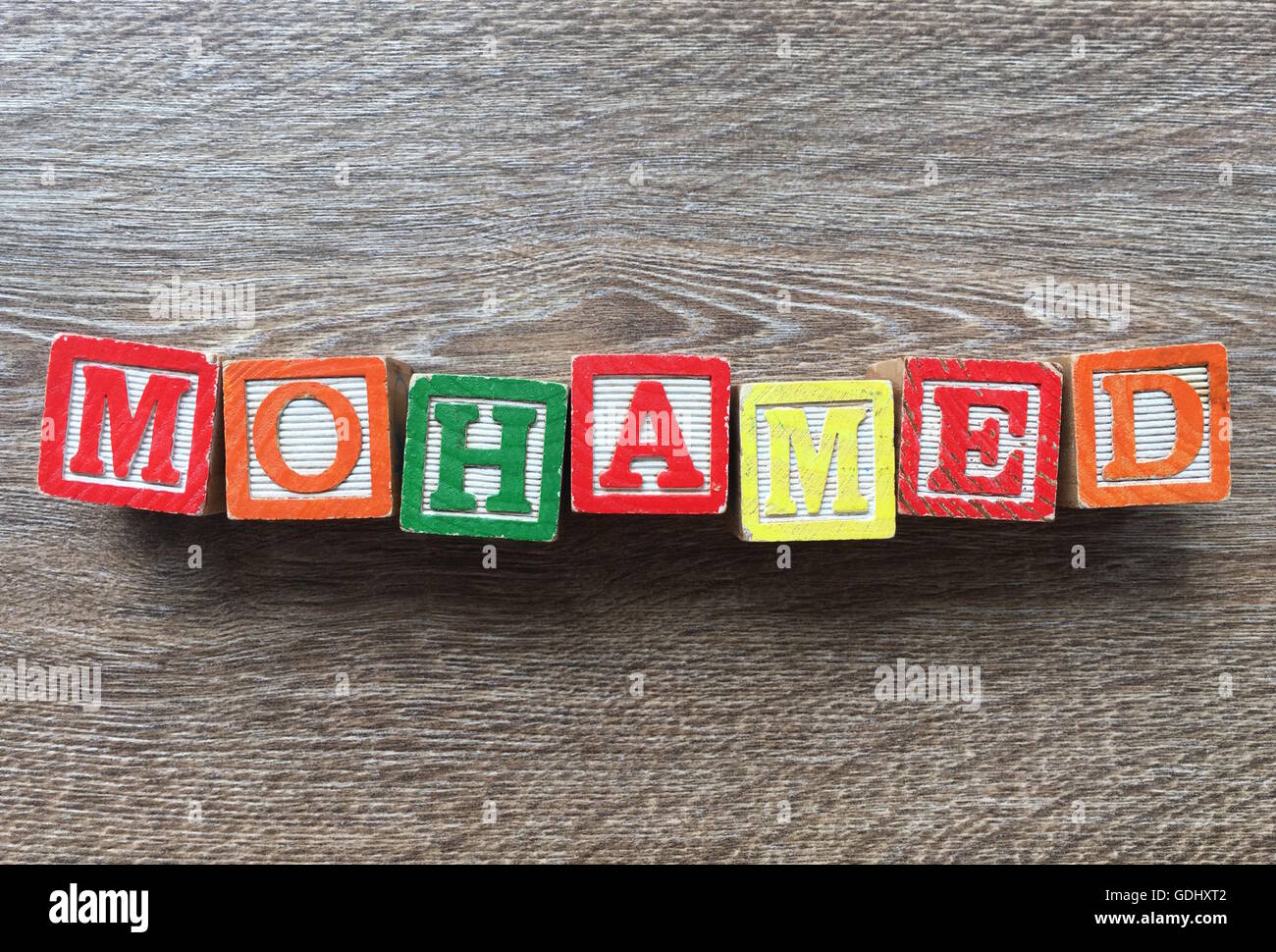 Mohamed name written with wood block letter toys Stock Photo - Alamy