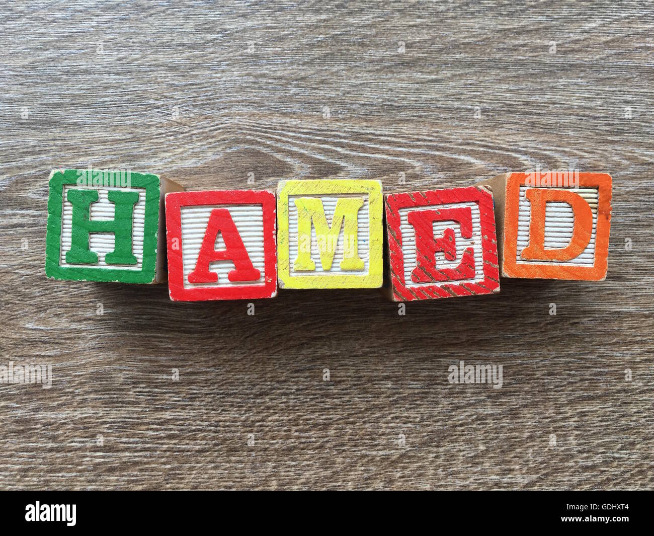 Hamed name written with wood block letter toys Stock Photo - Alamy