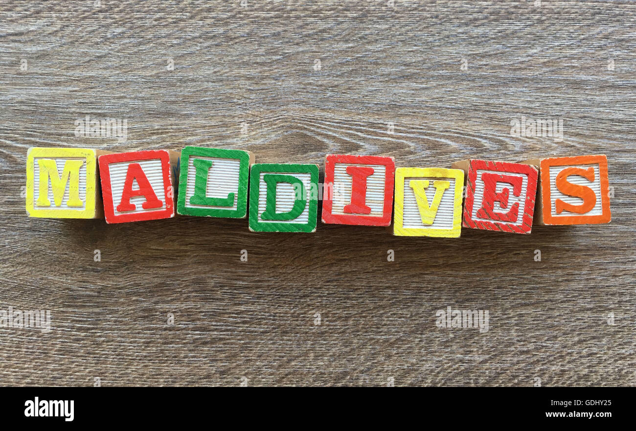 MALDIVES word written with wood block letter toys Stock Photo - Alamy