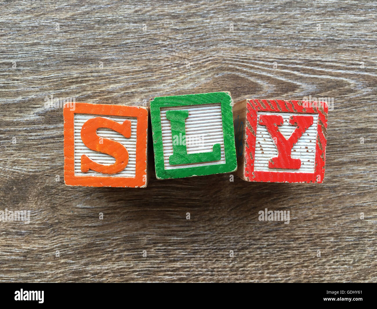 Sly name written with wood block letter toys Stock Photo - Alamy