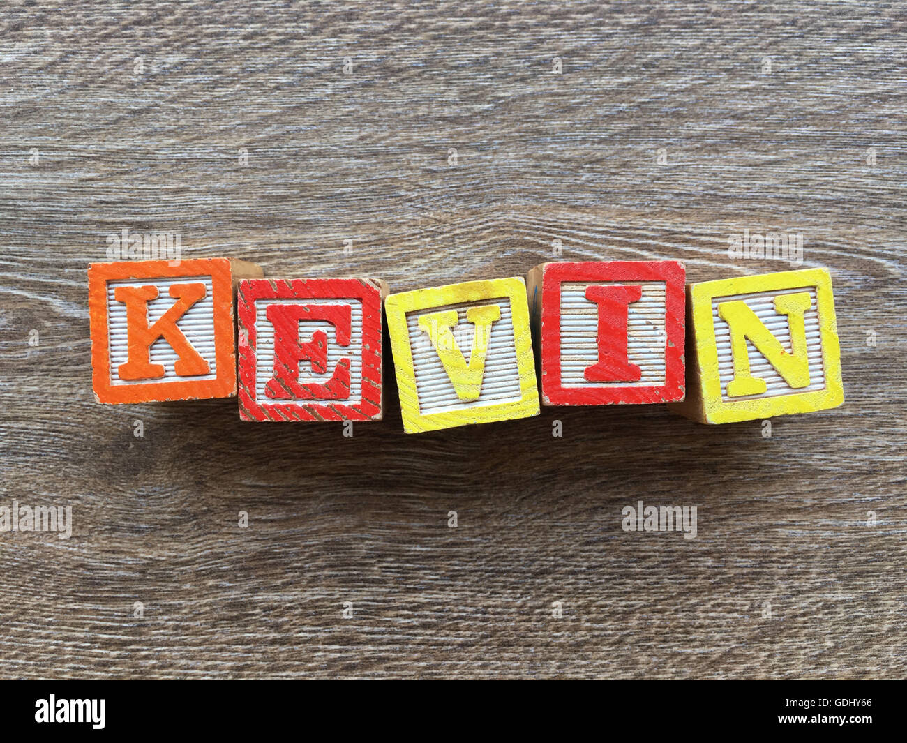 Kevin name written with wood block letter toys Stock Photo - Alamy