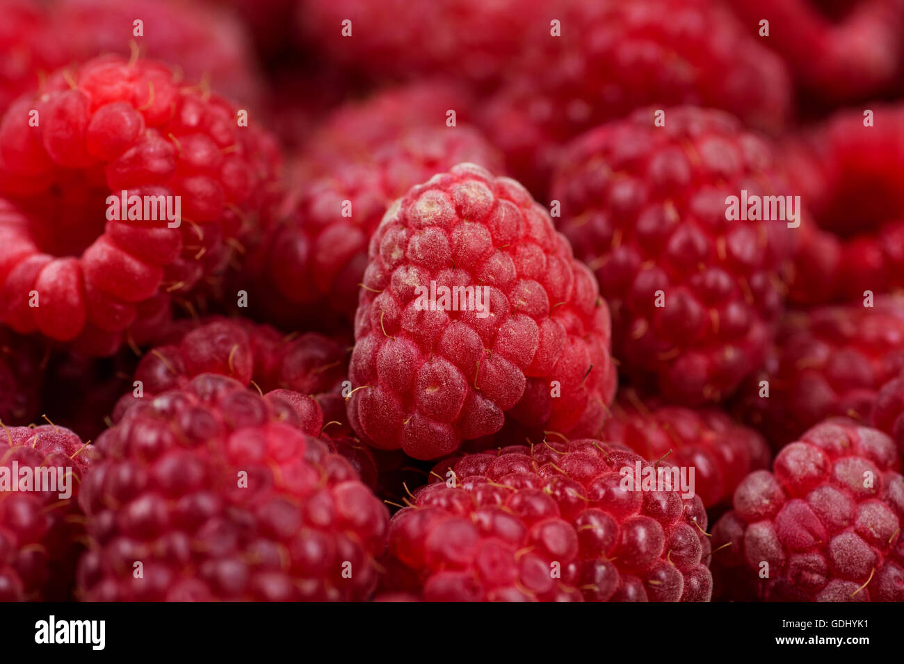 Raspberry fruit background Stock Photo - Alamy