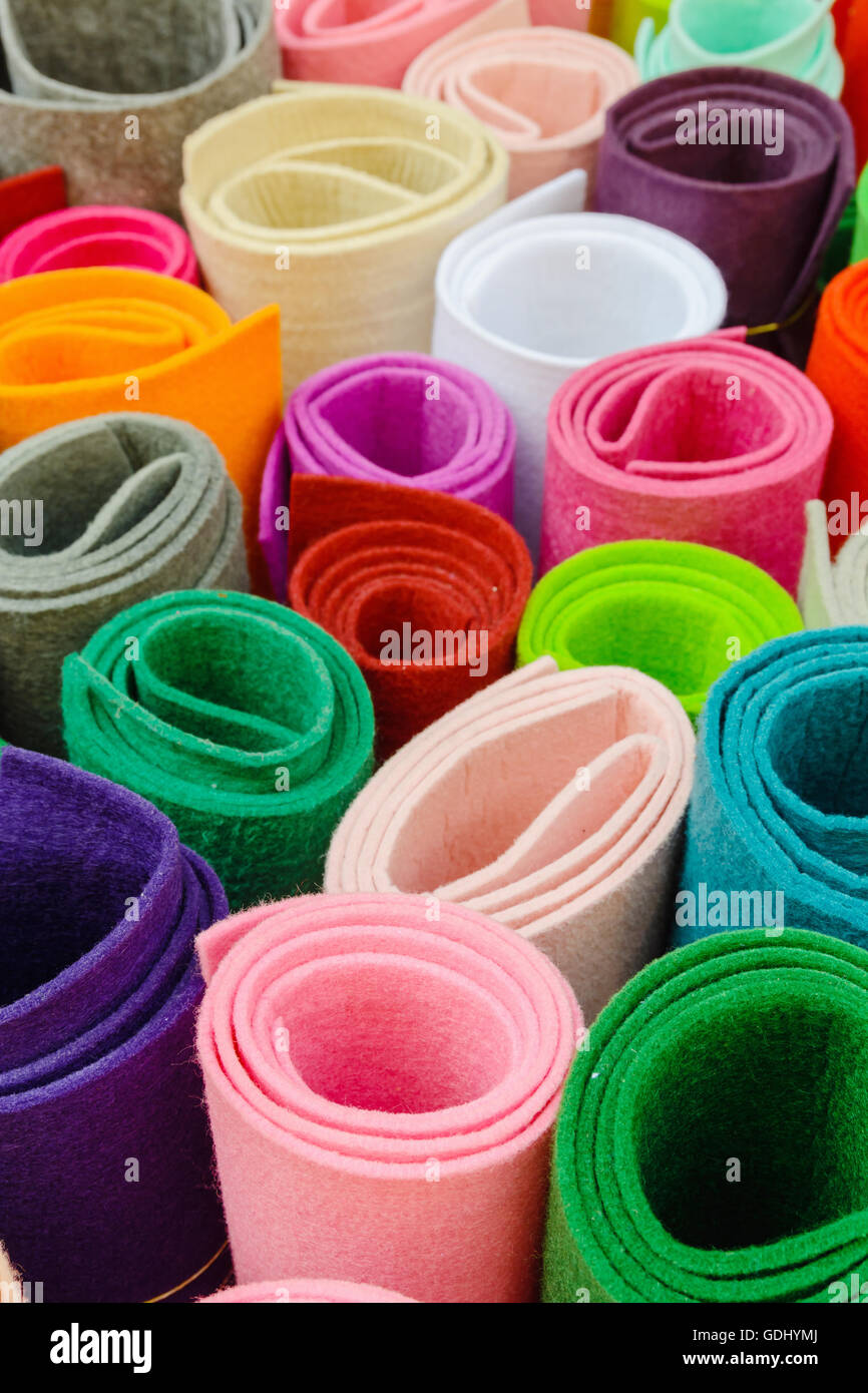 Rolls of colored fabrics. Color felt bright colors Stock Photo - Alamy