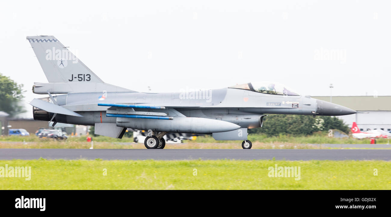 LEEUWARDEN, THE NETHERLANDS - JUN 11, 2016: Dutch F-16 fighter jet take off during the Royal ...