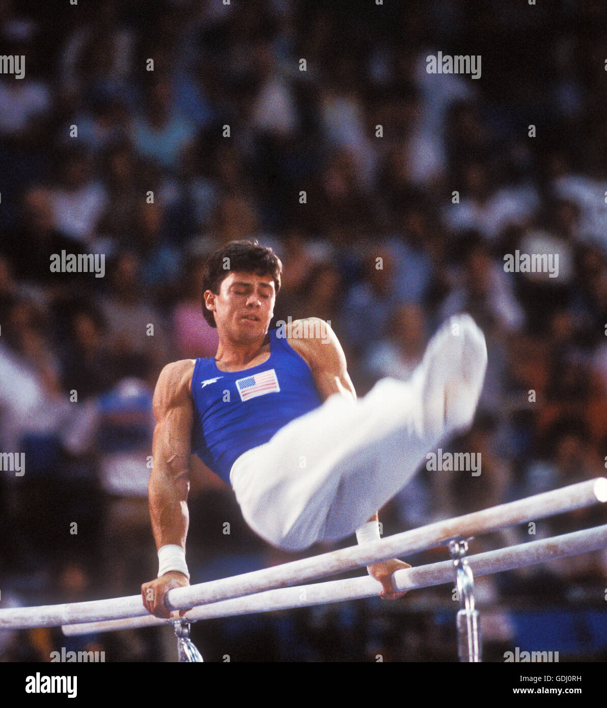 Mitch Gaylord of USA performs on parallel bars at 1984 Olympic Games in ...