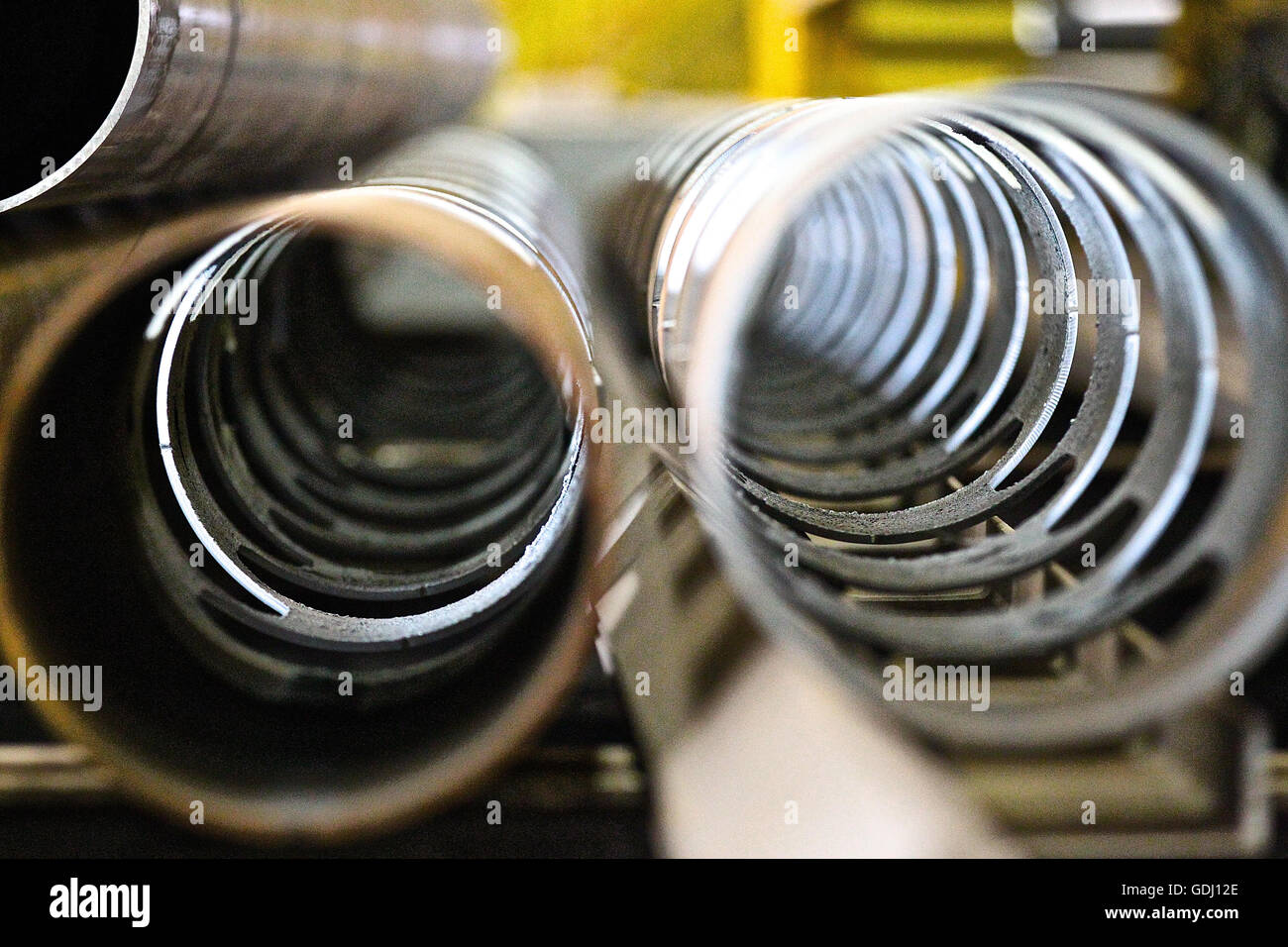 Pipe with oval holes as part of metal structures Stock Photo - Alamy