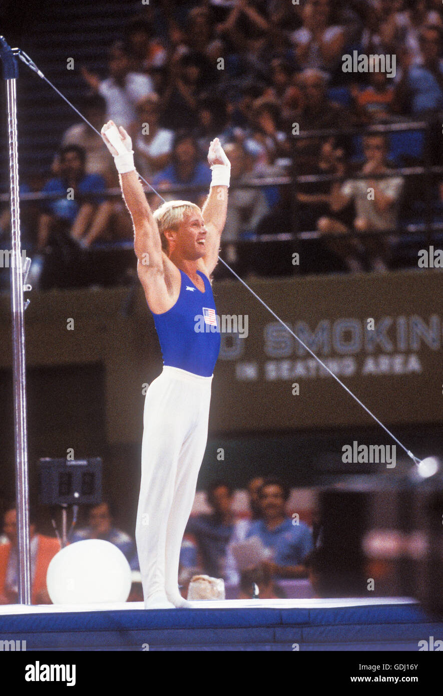 Bart Conner of USA receives applause from crowd during gymnastics ...