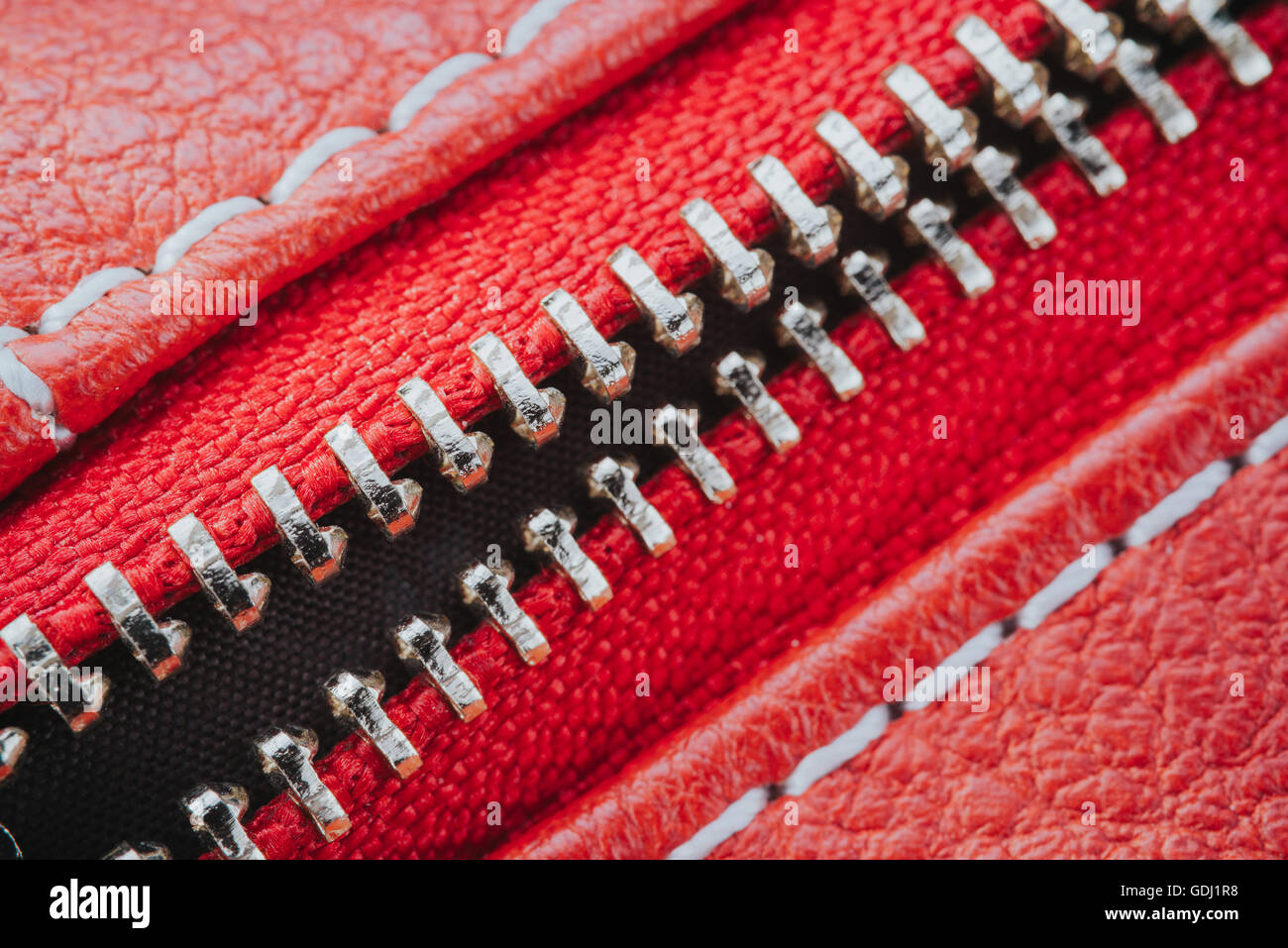 red leather with zipper texture Stock Photo - Alamy