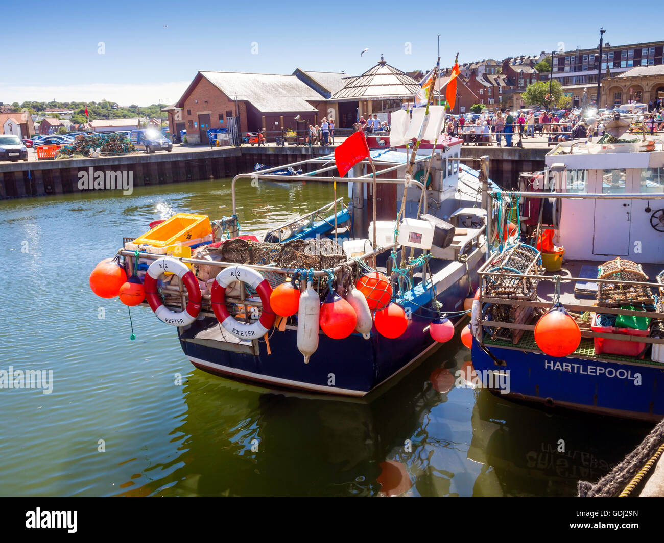 Small commercial fishing boats equipped with pots and floats for crab ...