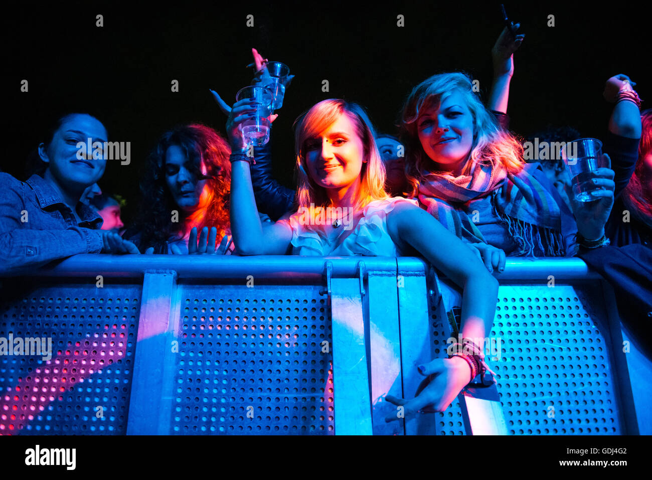 Girls in the first row at rock concert at night posing @ Zagreb ...