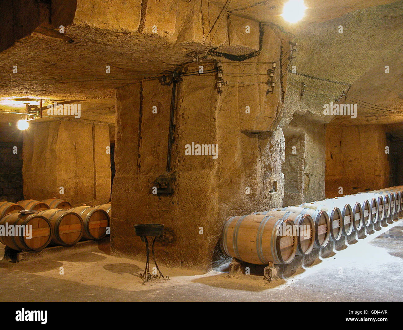 barrel room in ancient quarry at Château Ausone, Saint-Émilion Stock ...