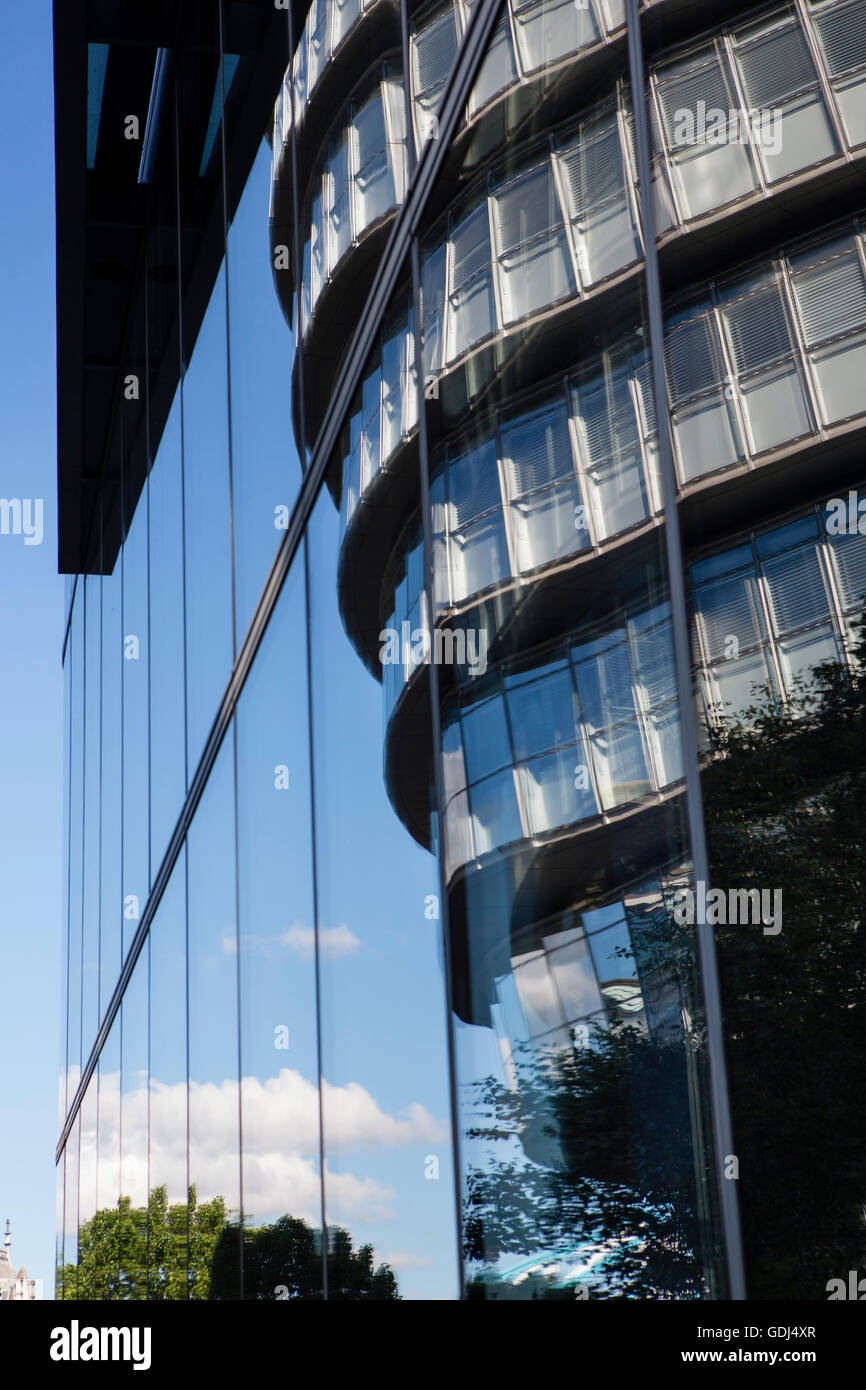 Reflection of City Hall, London in local buildings. City Hall is home ...