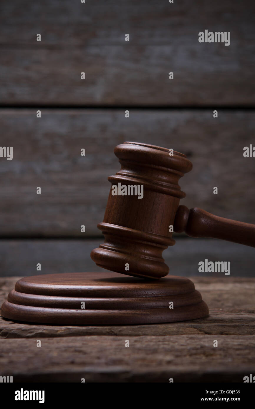 Brown gavel with a stand Stock Photo - Alamy