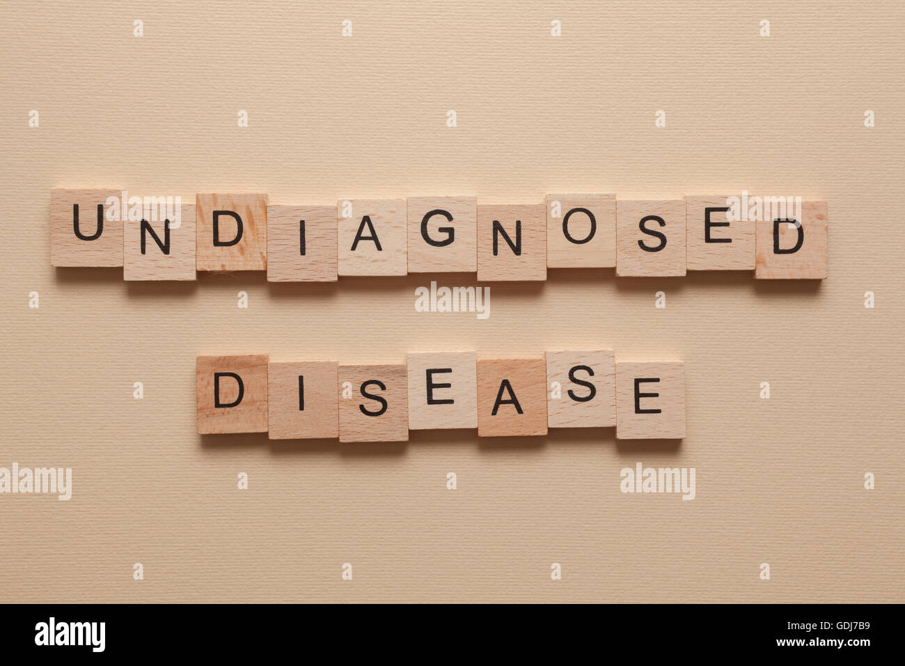 The word Undiagnosed disease formed with wooden letters Stock Photo - Alamy