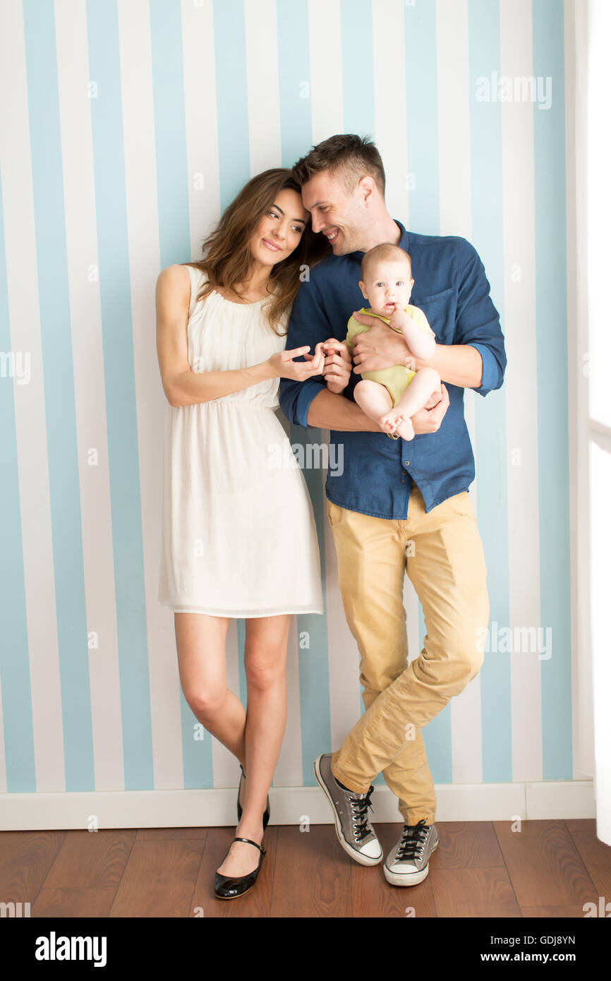 Happy family with newborn baby Stock Photo - Alamy