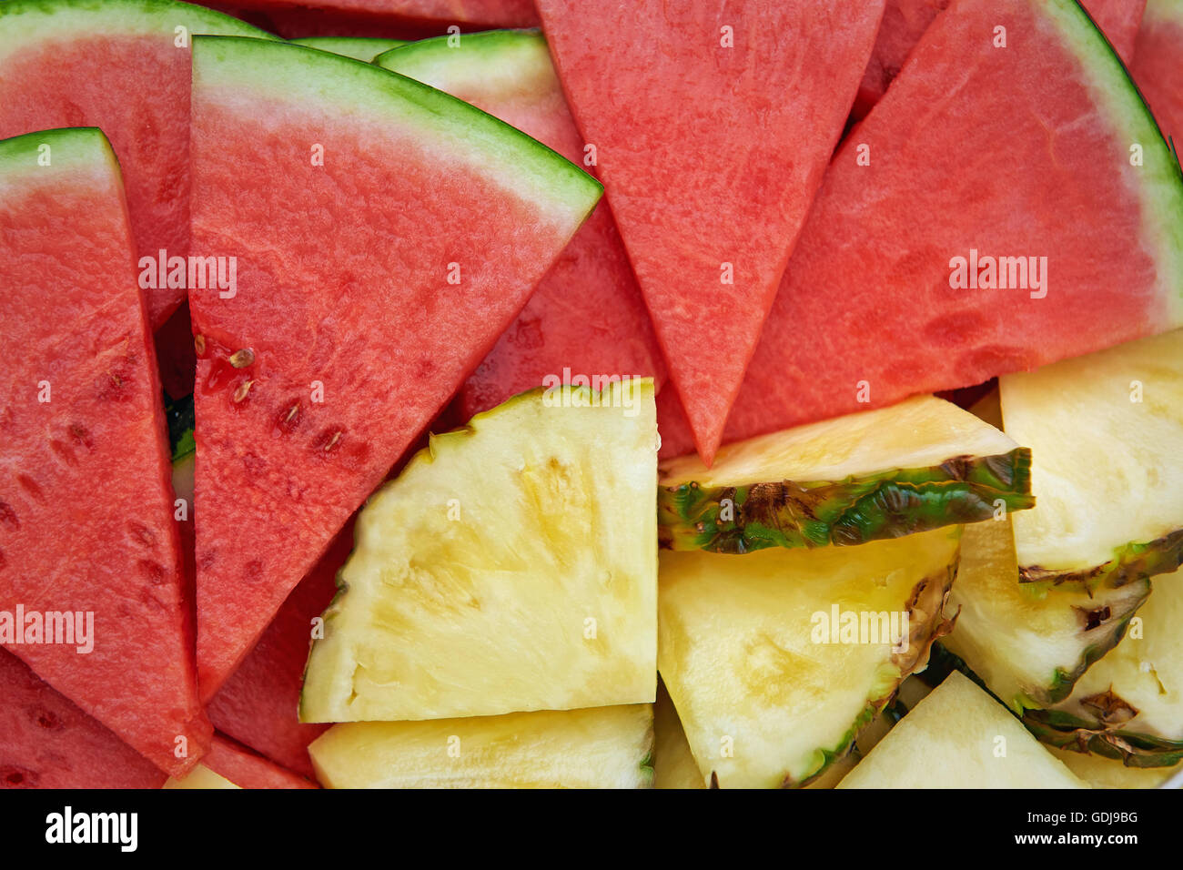 Closeup image of sliced pineapple and watermelon Stock Photo - Alamy