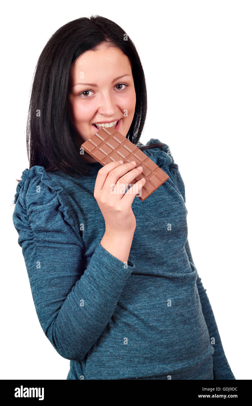 teenage girl eating chocolate Stock Photo - Alamy