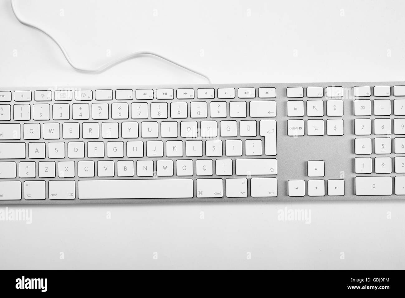White computer keyboard on a white background Stock Photo - Alamy
