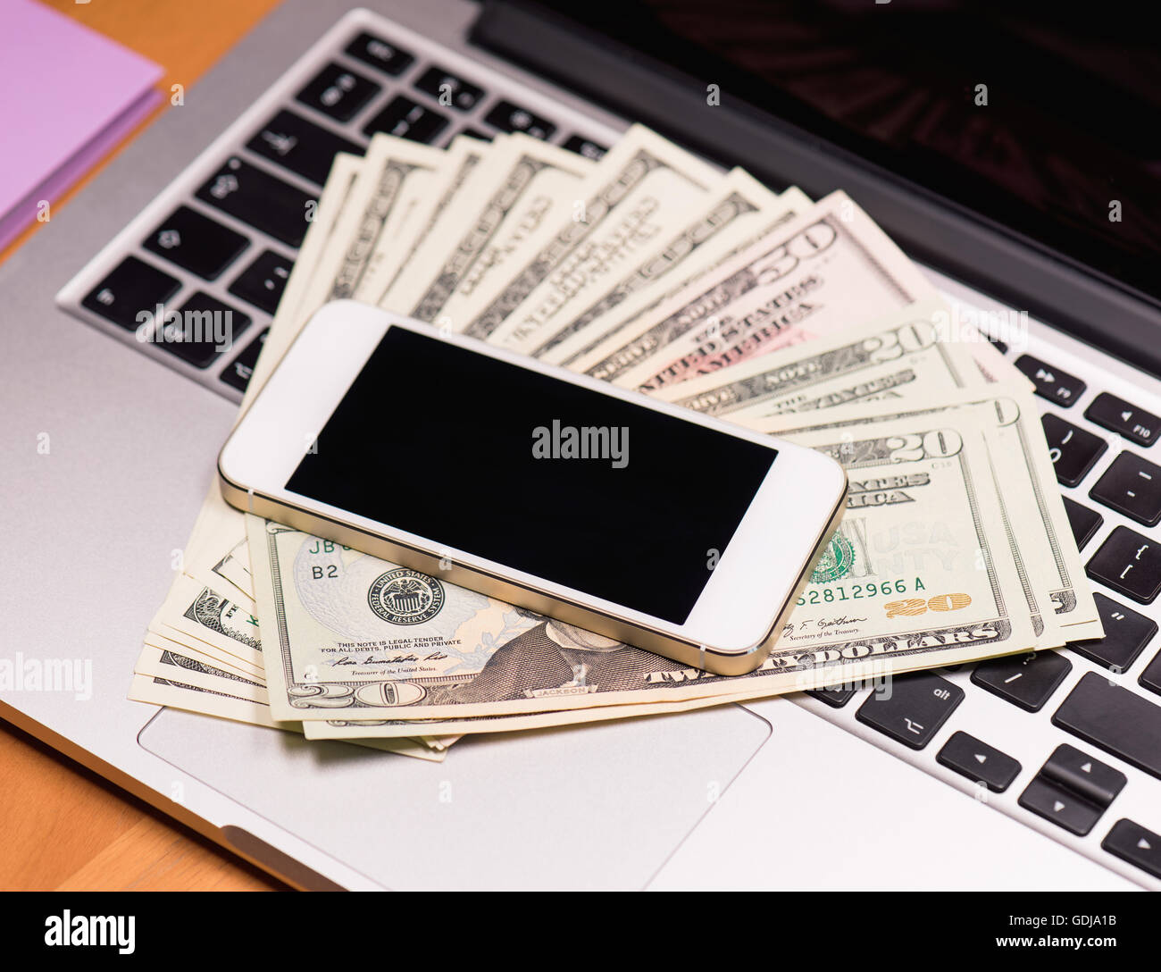 Money electronic devices hi-res stock photography and images - Alamy
