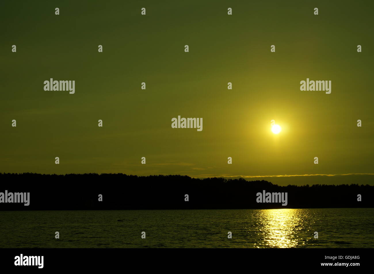 Beautiful sunset at the beach, amazing colors, light beam shining ...
