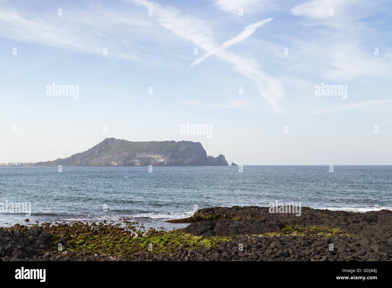 Black lava rocks at the coast at Seopjikoji on Jeju Island in South ...