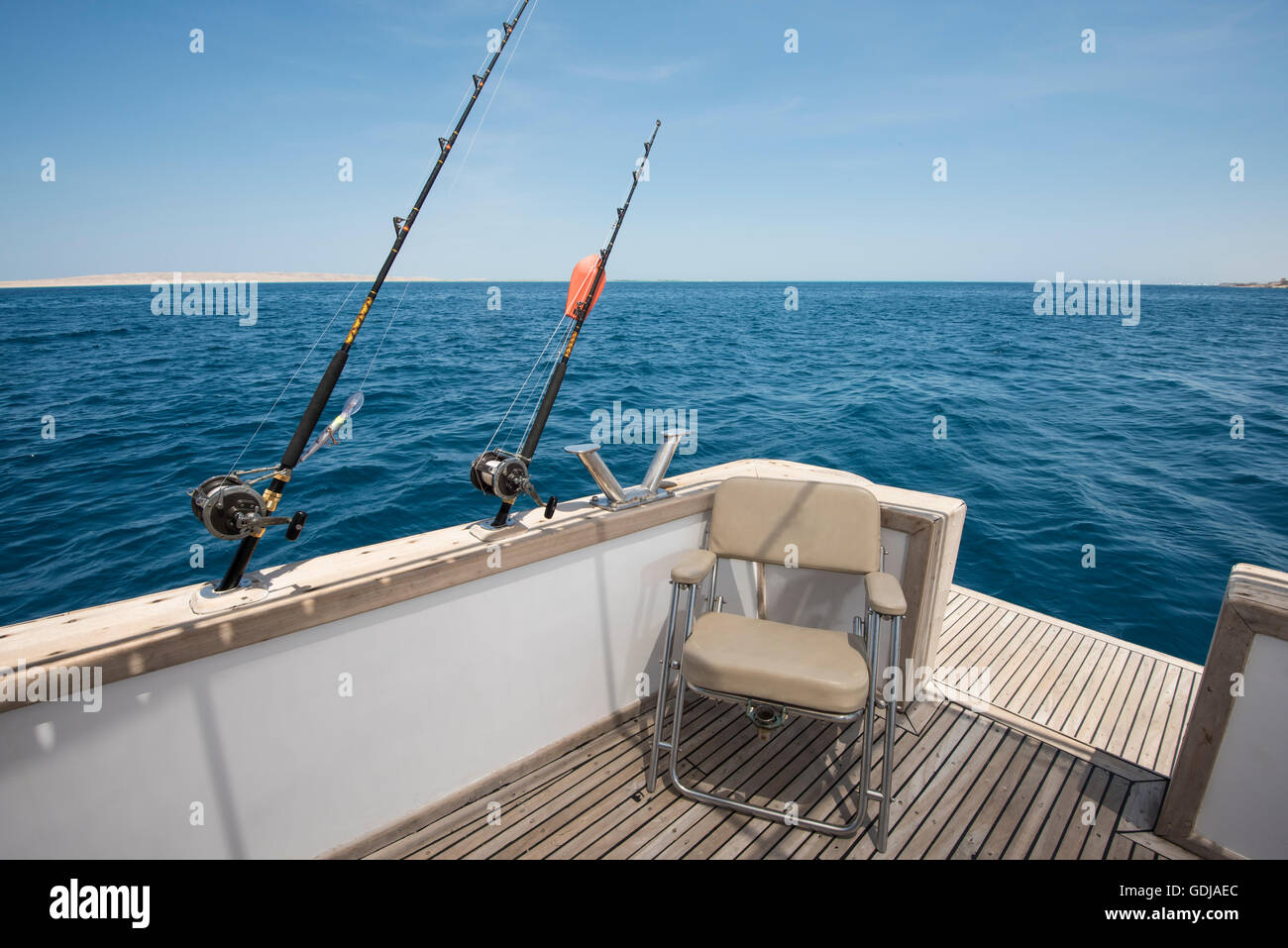 View of tropical ocean from back of a luxury sports motor boat with ...
