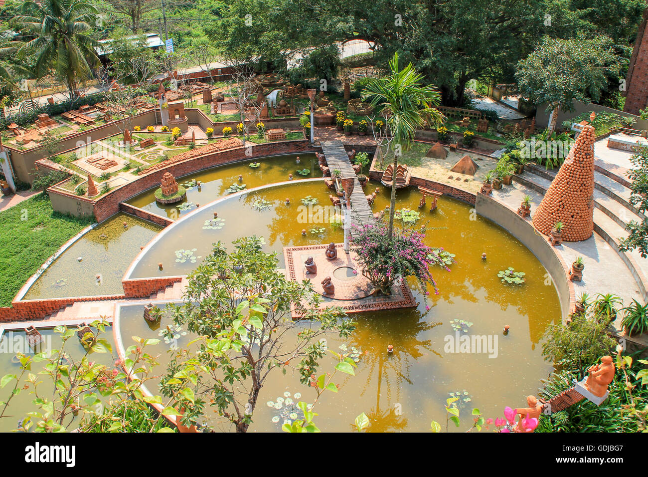 Beautiful pond with pottery sculptures Stock Photo - Alamy