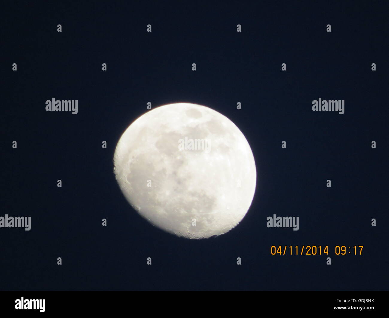 picture of the moon taken at just after dark Stock Photo - Alamy