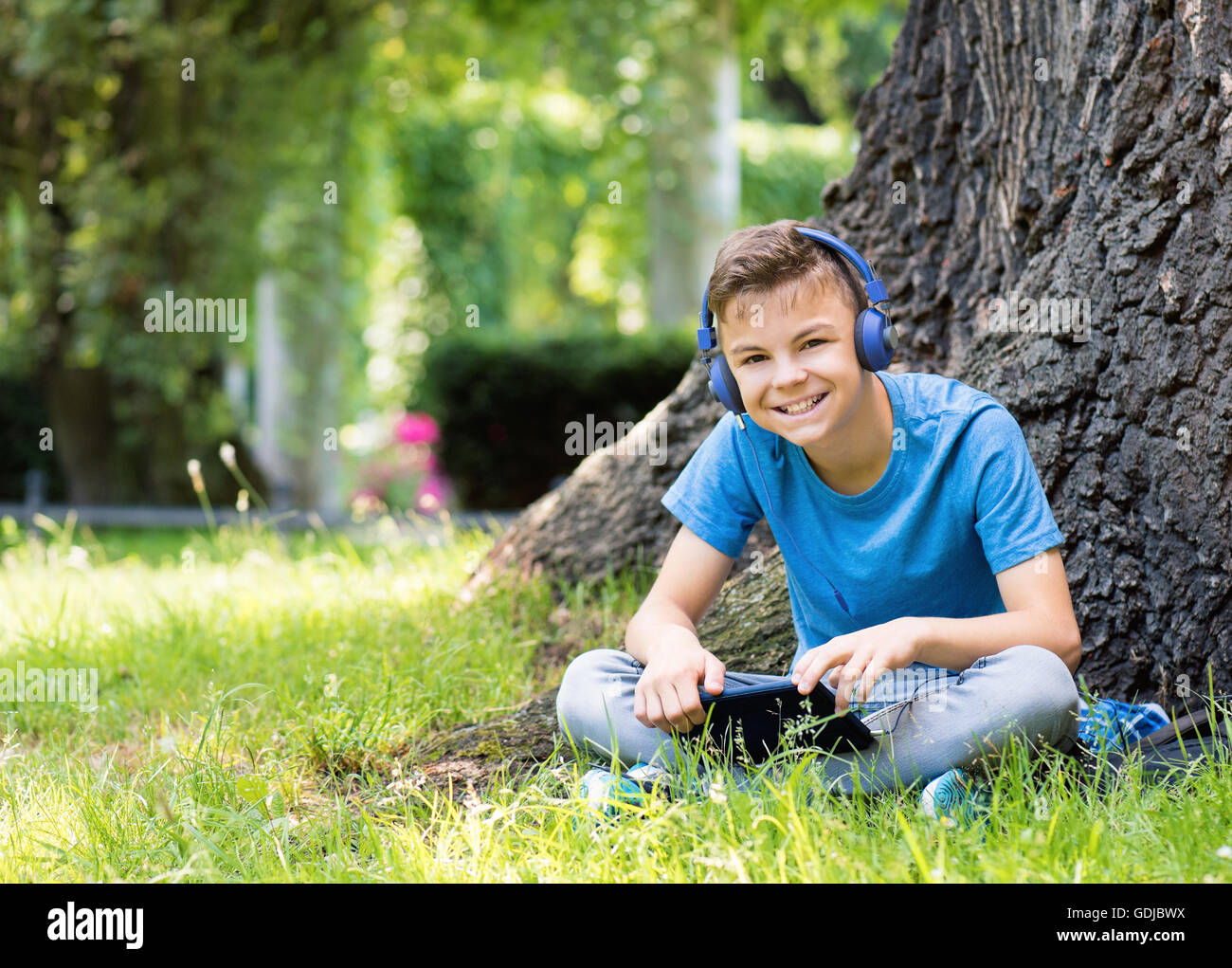 Boy with tablet Stock Photo - Alamy