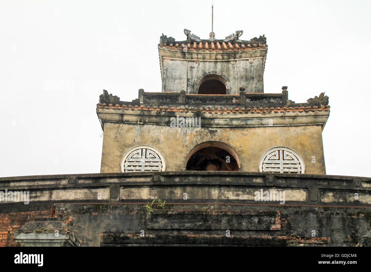 Traditional style vietnamese multi tiered building Stock Photo - Alamy