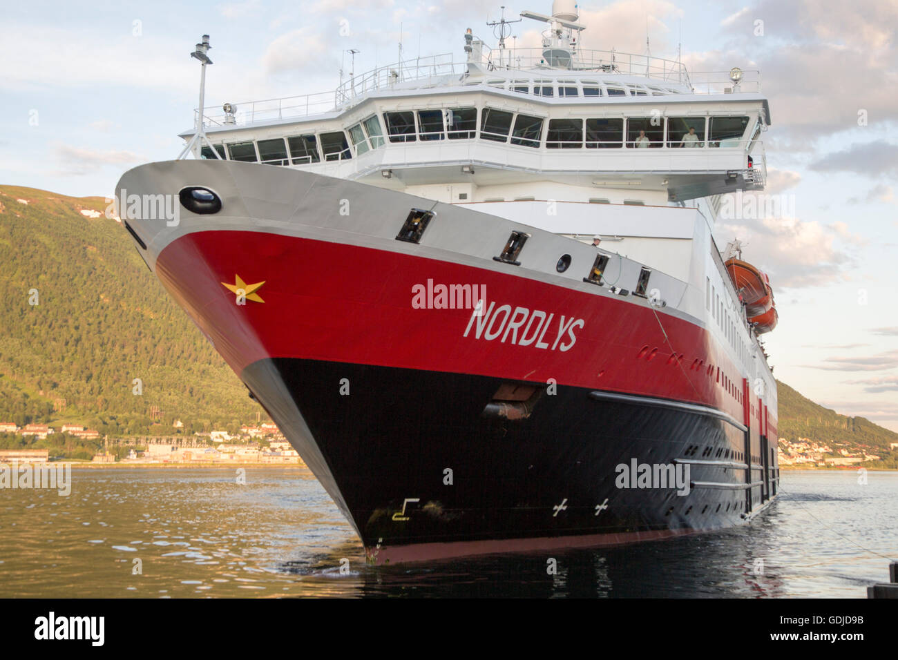 Hurtigruten ferry nordlys approaching tromso hi-res stock photography ...