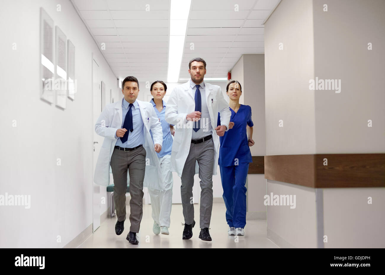 group of medics walking along hospital Stock Photo - Alamy