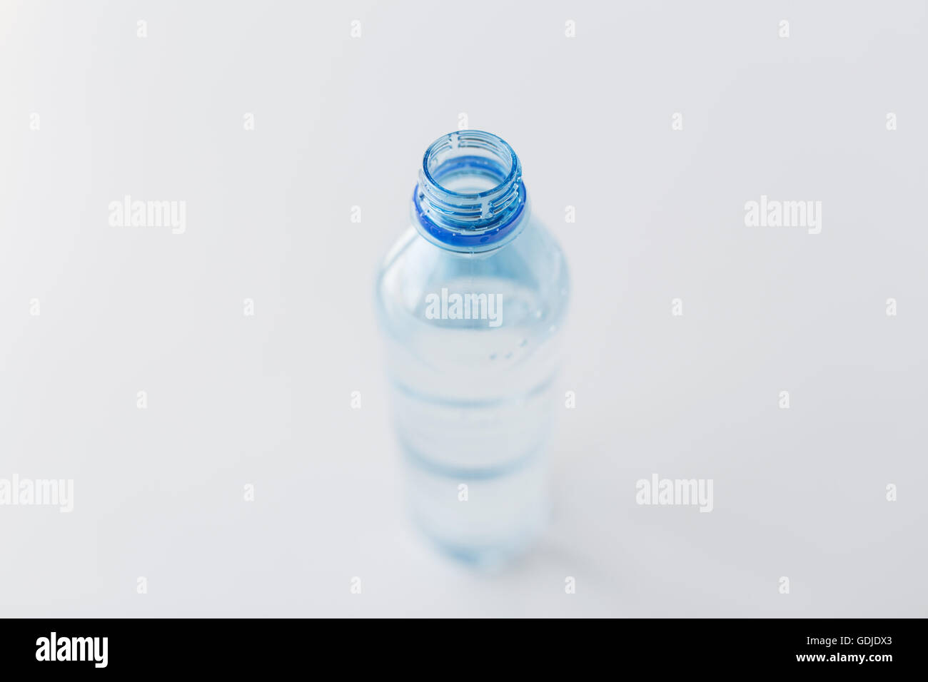 close up of bottle with drinking water on table Stock Photo - Alamy